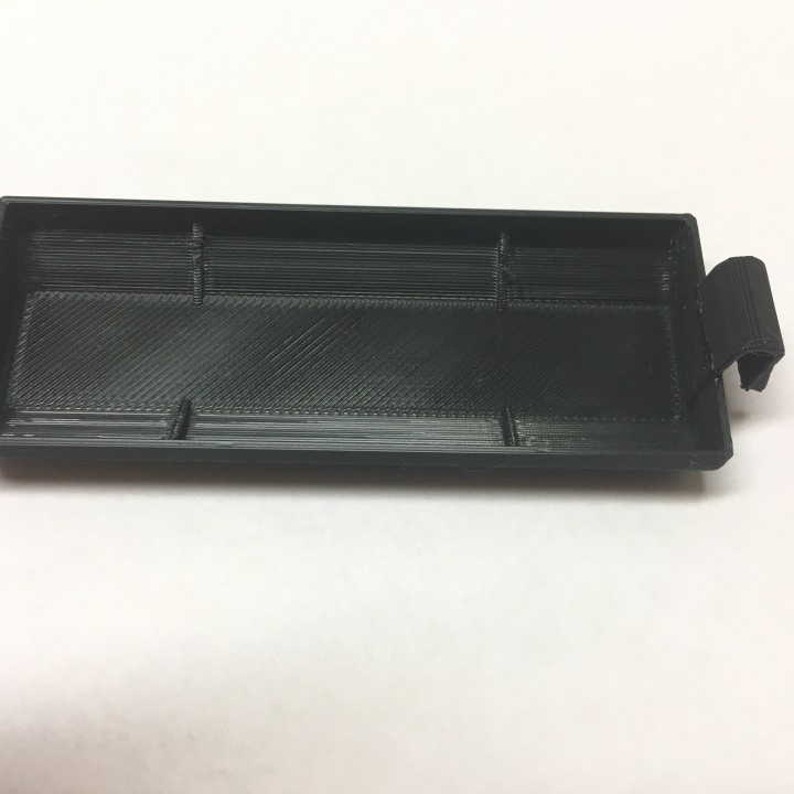 3D Printable WOW! Remote Battery Cover by Kevin Colgan