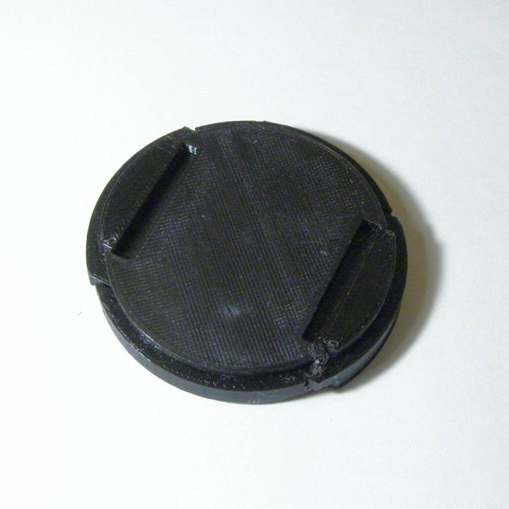 3D Printable Nikon Lens Cap by Devin Gentner