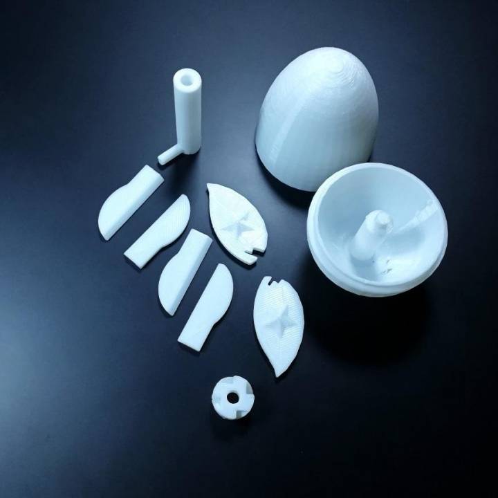 3D Printable Flower Wheel Egg Toy #TinkercadEaster by Erin Rouse