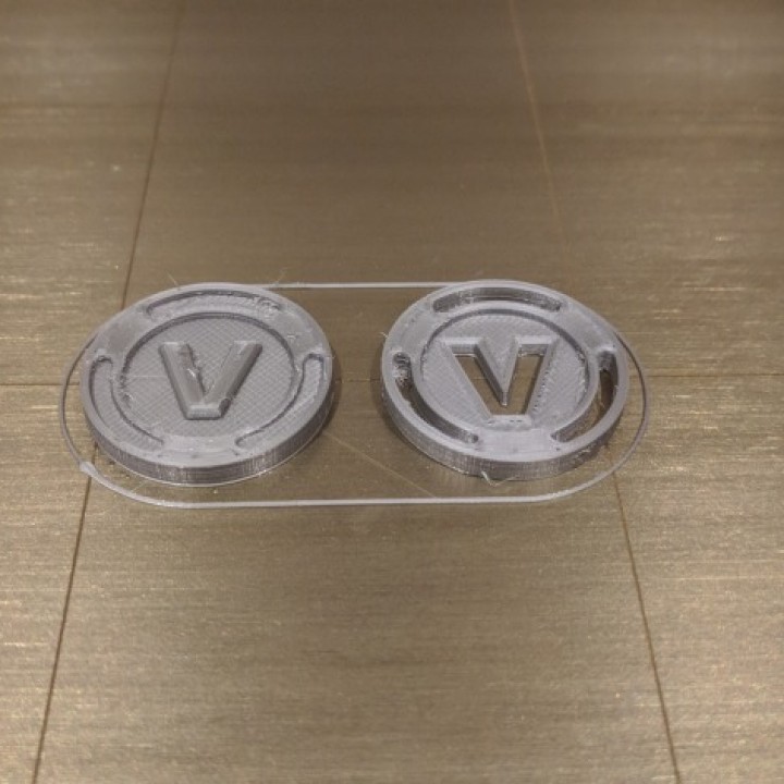 3D Printable Fortnite v-bucks coin, two variants by Hein Andre Grønnestad