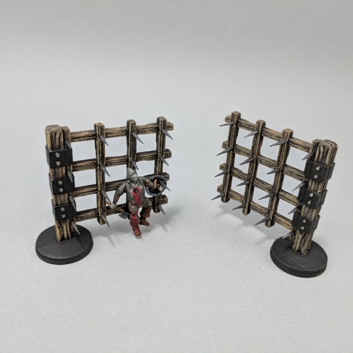 3D Printable Spike Wall Trap by Devon Jones