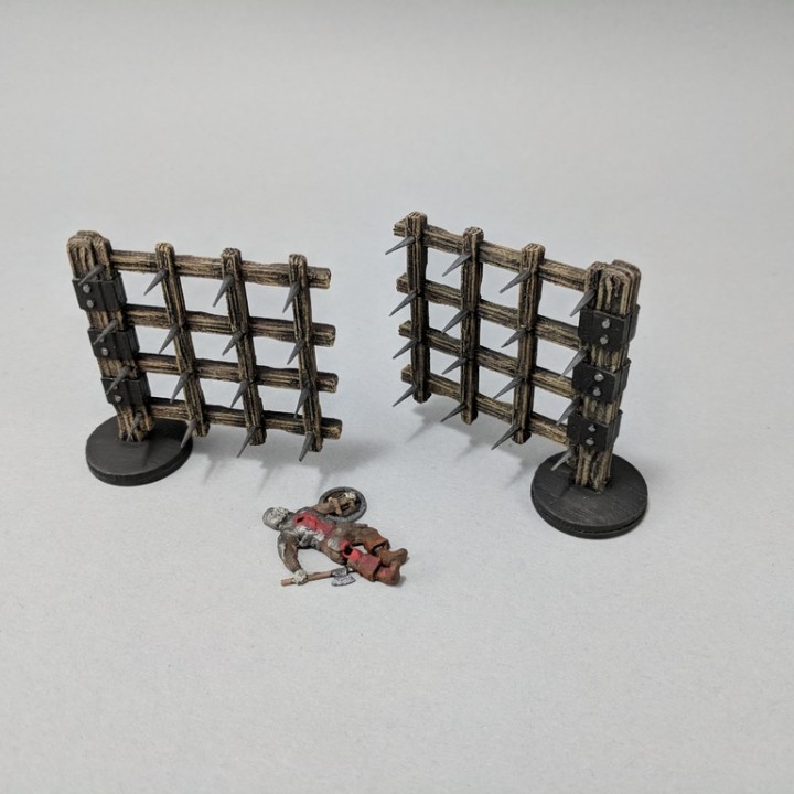 3D Printable Spike Wall Trap by Devon Jones