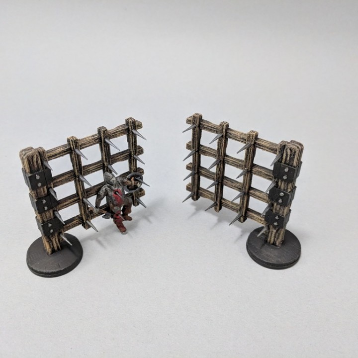 3D Printable Spike Wall Trap by Devon Jones