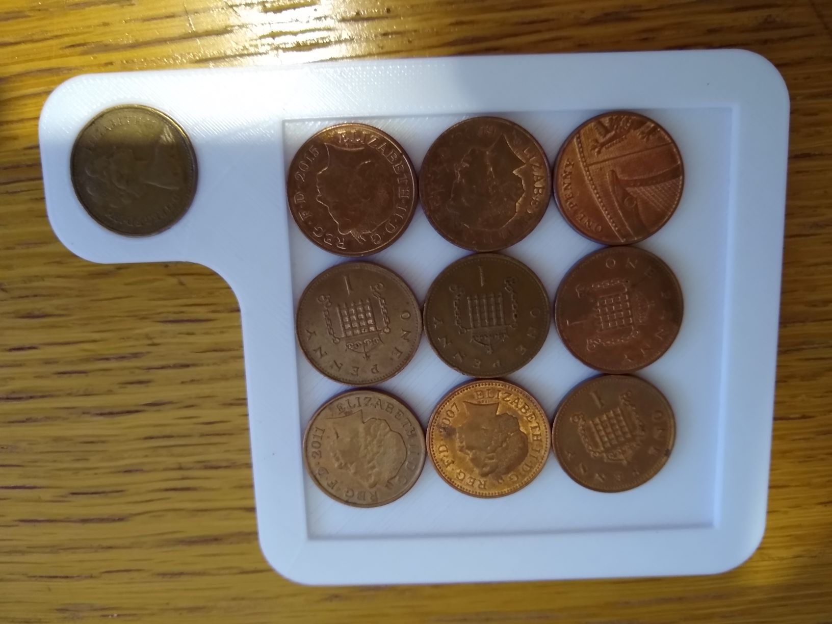 3D Printable 10 Penny Puzzle by Arden Markin