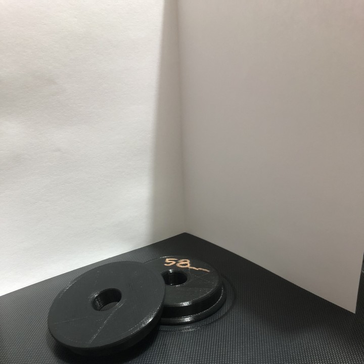 3D Printable AnyCubic Spool Shaft Caps 58mm by Michael Ellis