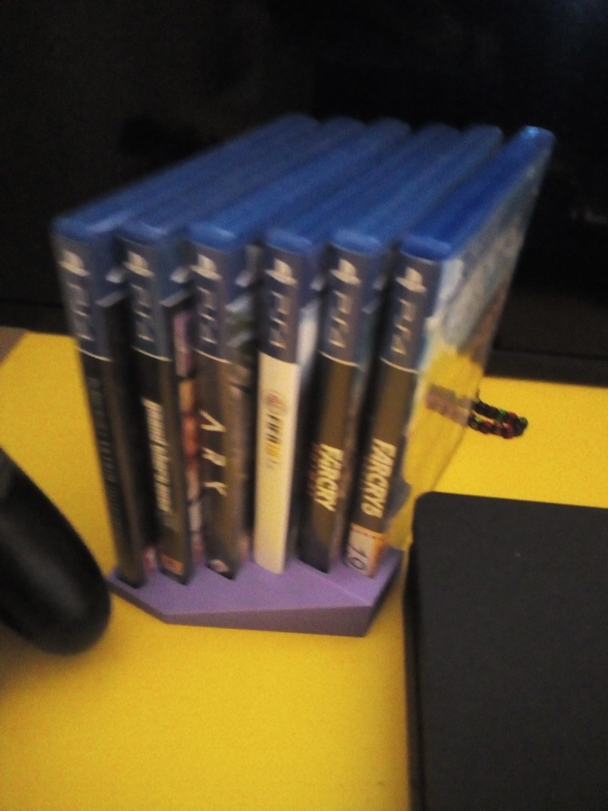 3D Printable PS4 game holder by Alfredo Pino