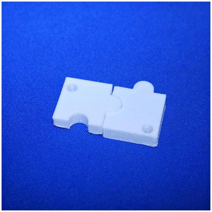 3D Printable puzzle keychain by Paul Leachman