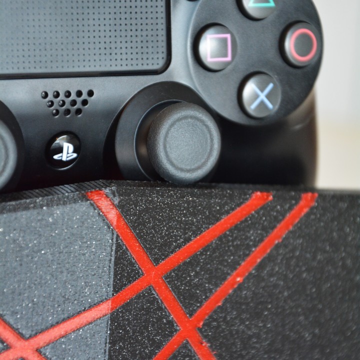 3D Printable Controller Stand (PS4 Dualshock) by Duncan Smith