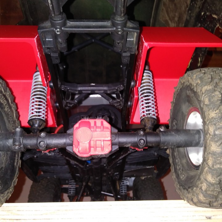 3D Printable SCX10 II Jeep Cherokee Wheel Wells by Dominic Soucy