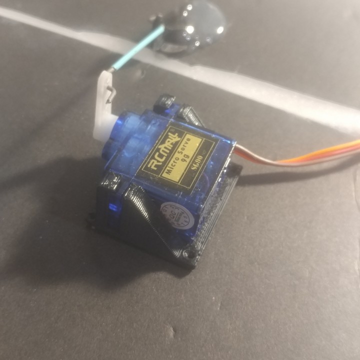 3D Printable 9g Servo Holder by Devan Metz