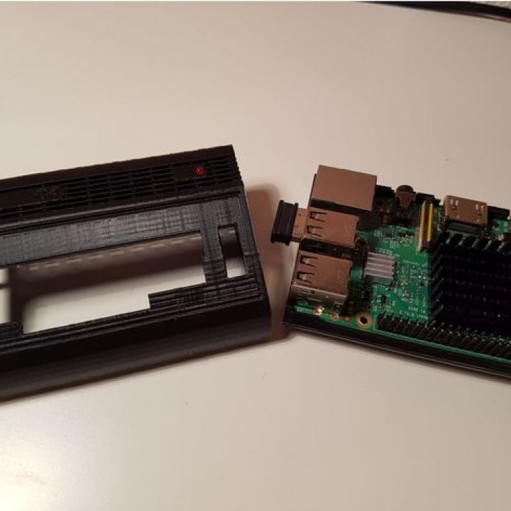 3D Printable Mini C64 Raspberry Pi 3 and Pi 4 Case by Gergely Javor