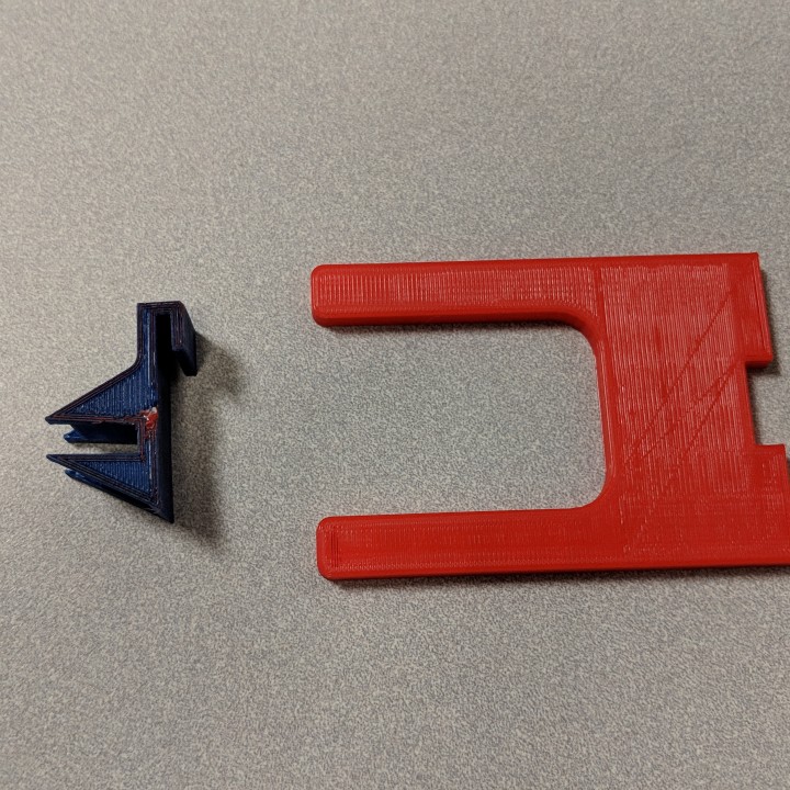 3D Printable Barcode Scanner Gun Holder for Slot Wall by Matt McQueen
