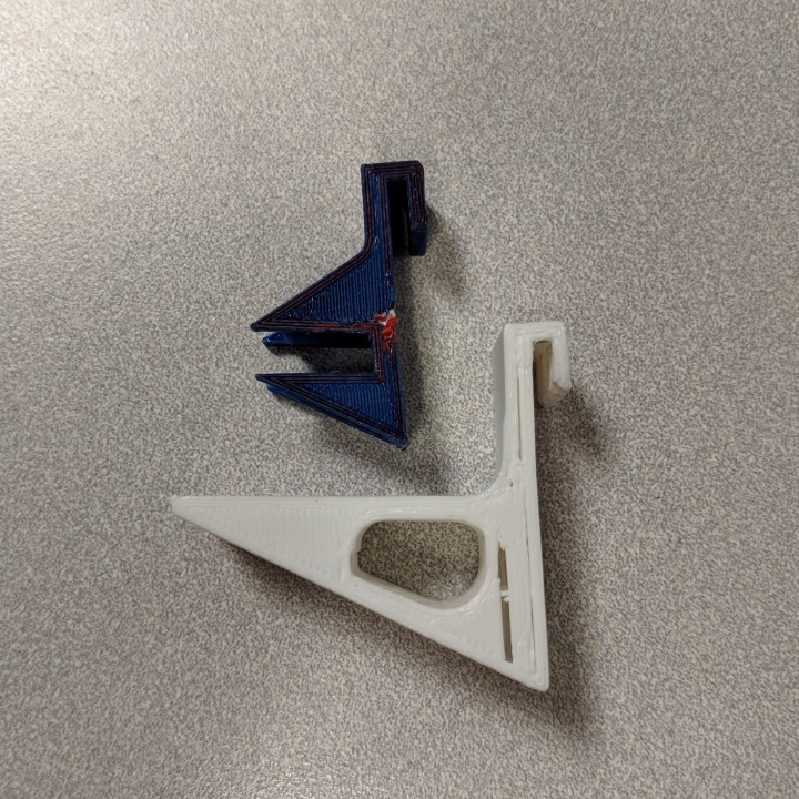 3D Printable Barcode Scanner Gun Holder for Slot Wall by Matt McQueen