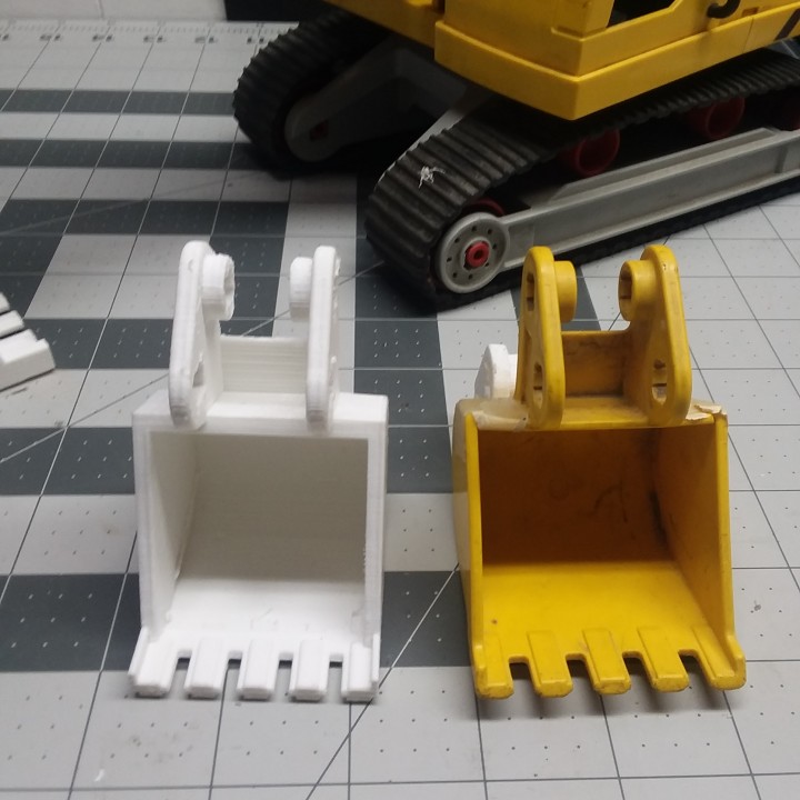 3D Printable Construct Toys Excavator Bucket by Paul