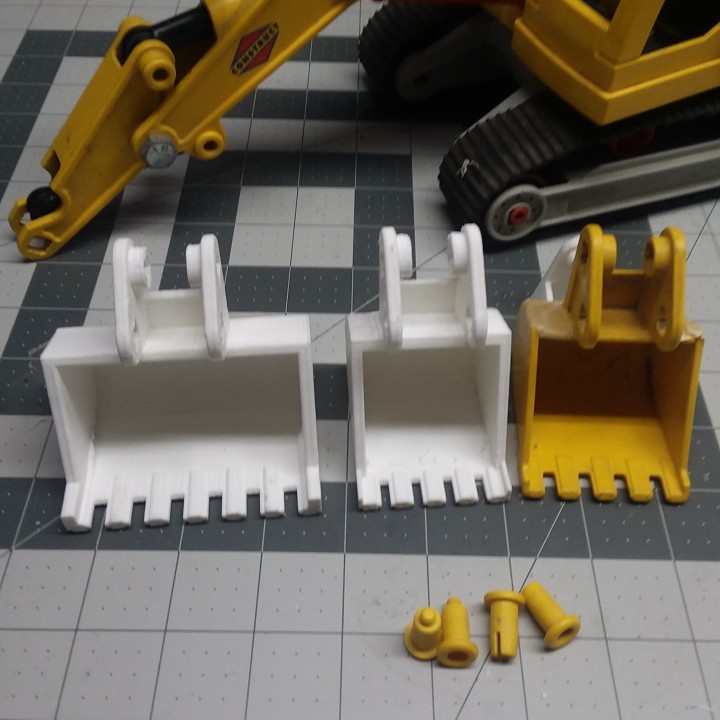 3D Printable Construct Toys Excavator Bucket by Paul