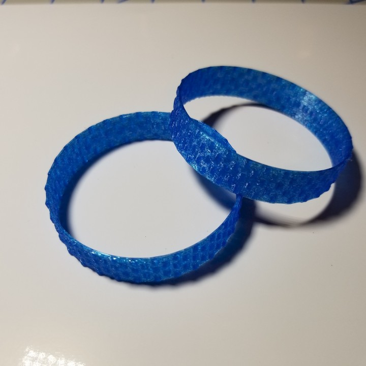 3D Printable Anki Vector Wheel Tread Knobby Pattern by Steve Maples