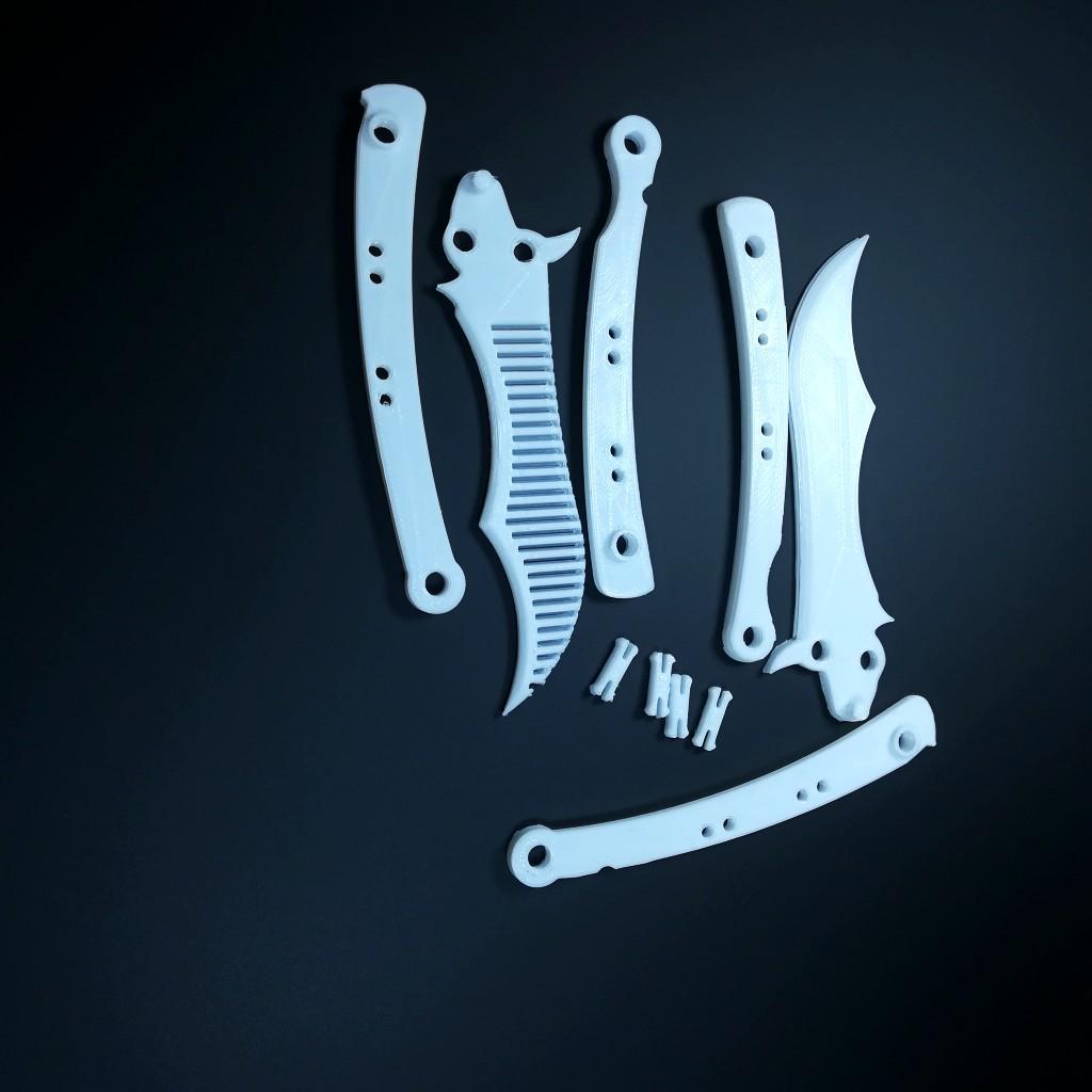 3D Printable Copy of CSGO Balisong by Skyler Spencer