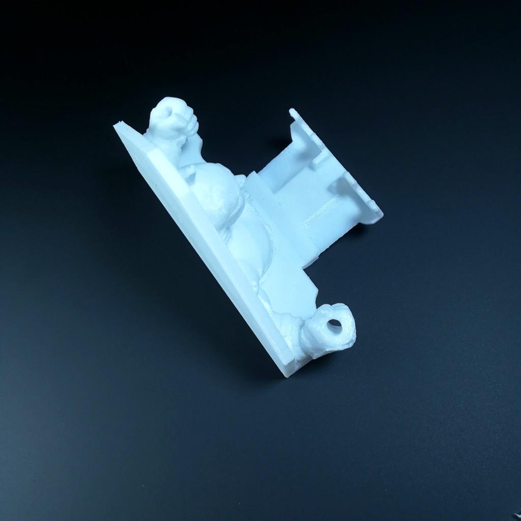 3D Printable HUTINPlayStation 4 (PS4) Controller Wall Mounts by peter