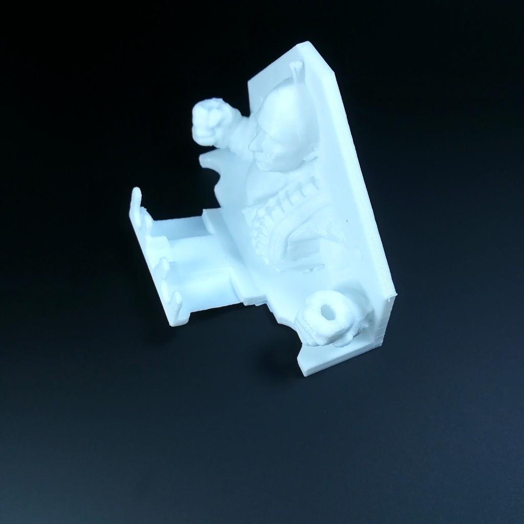 3D Printable HUTINPlayStation 4 (PS4) Controller Wall Mounts by peter