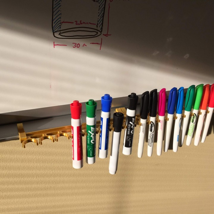 3D Printable Snappy Dry Erase Marker Holder by Amos Manneschmidt