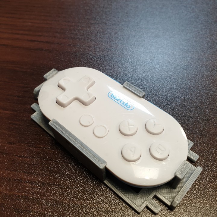 3D Printable 8bitdo ZERO phone holder by Alexandr Tamosin