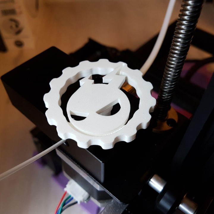 3D Printable BIQU Thunder Logo Extruder Wheel by Jose Luis