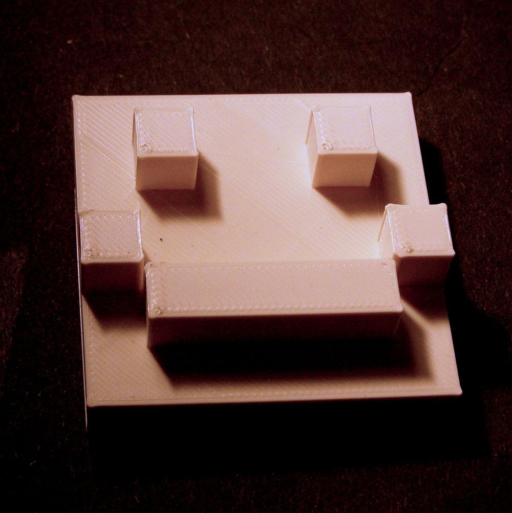 3D Printable Pixilated Smiley Face by Christian Greene