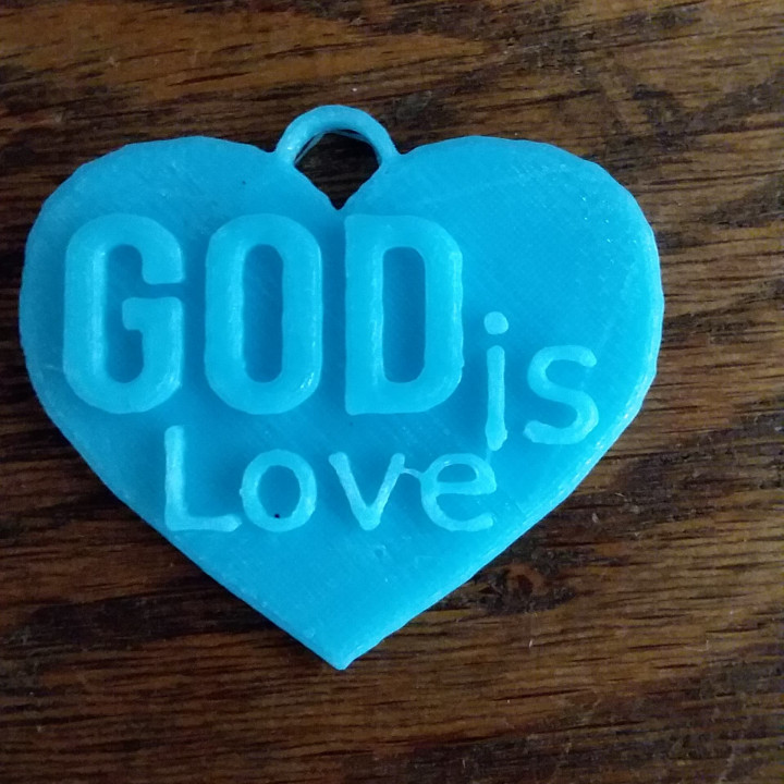3D Printable GOD is Love Heart Pendant by Joshua Wilkins