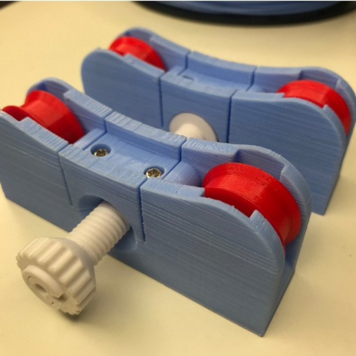 3D Printable Universal Spool Roller by Ubaid Mithawalla