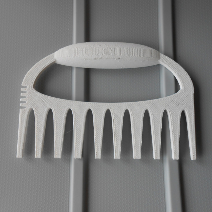 3D Printable Peg Loom Beater by Sandra James