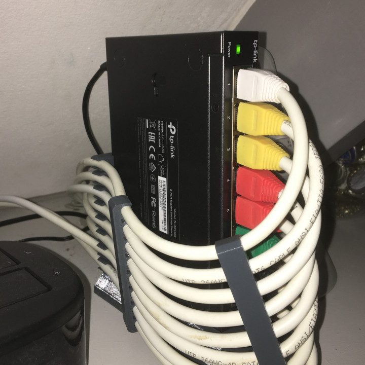 3D Printable TP-LINK TL-SG108S VERTICAL DESKTOP STAND. by Bishop