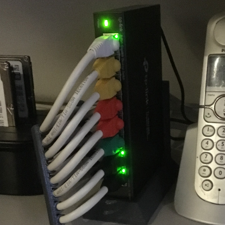 3D Printable TP-LINK TL-SG108S VERTICAL DESKTOP STAND. by Bishop