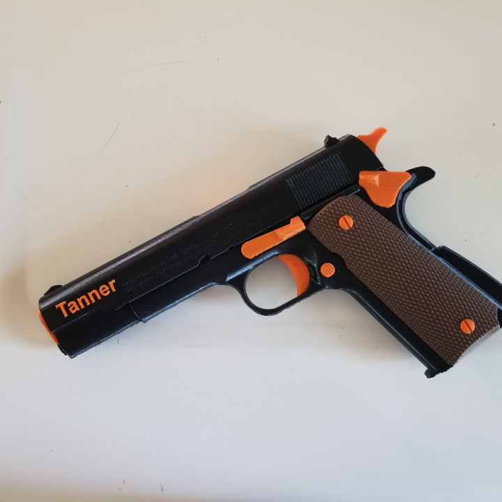 3D Printable Prop gun- Colt 1911 - Multicolor by Joe Prints