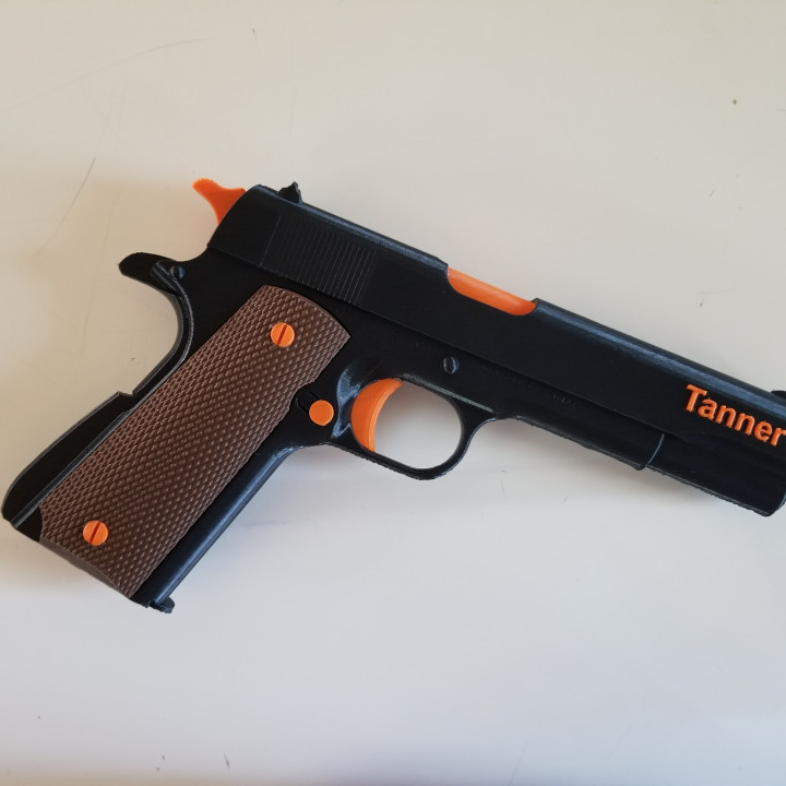 3D Printable Prop gun- Colt 1911 - Multicolor by Joe Prints