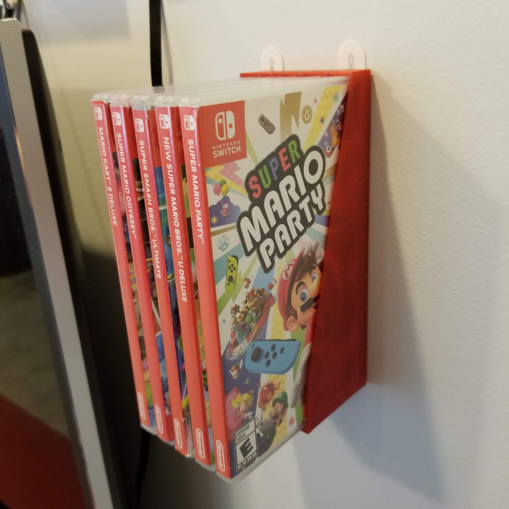 3D Printable Nintendo Switch Cartridge Shelf by Joel Bonasera