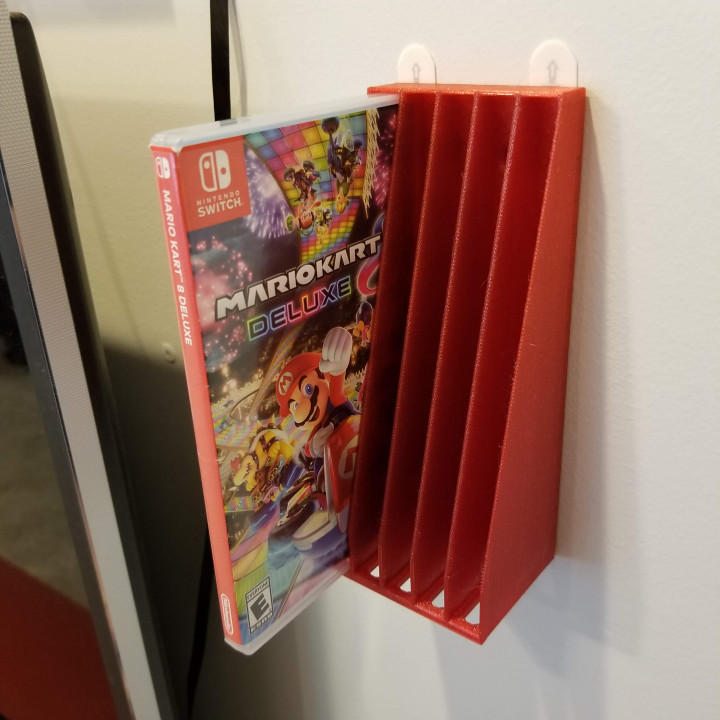 3D Printable Nintendo Switch Cartridge Shelf by Joel Bonasera