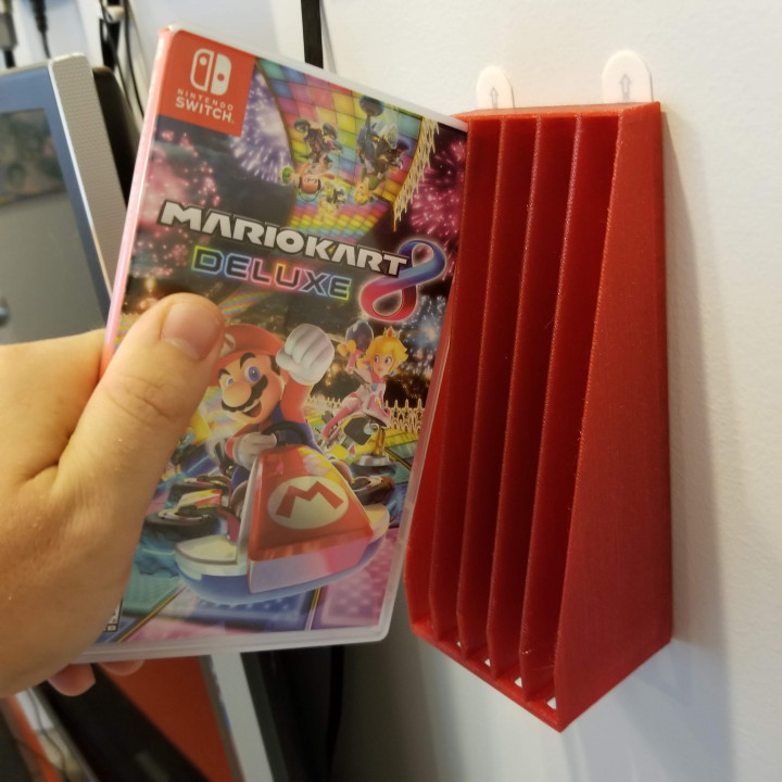3D Printable Nintendo Switch Cartridge Shelf by Joel Bonasera