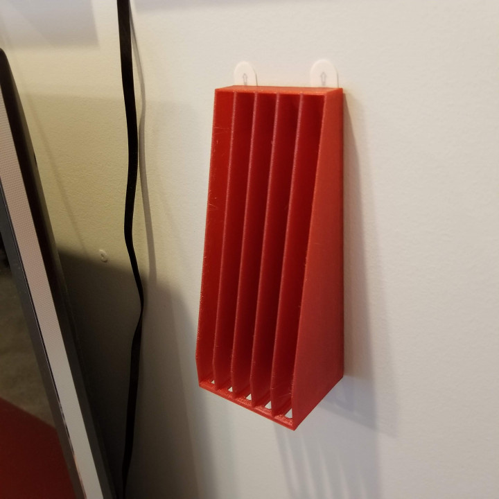 3D Printable Nintendo Switch Cartridge Shelf by Joel Bonasera