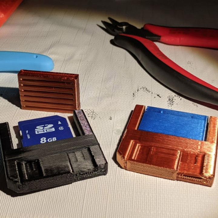 3D Printable Floppy Disk SD Card Holder Remix by William Katz