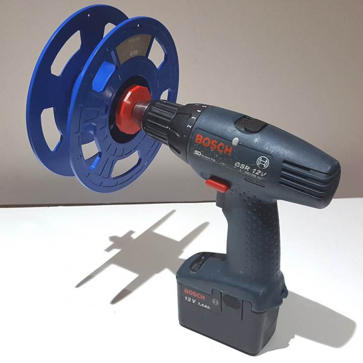 3D Printable Spool winder for Dremel by Leslie Kaye