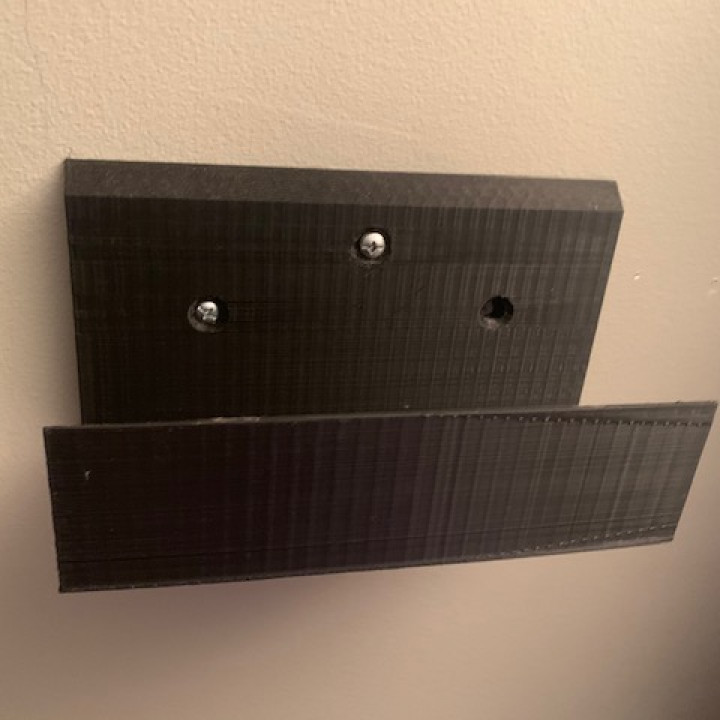 3D Printable Nintendo Switch Wall Mount by William Jimenez