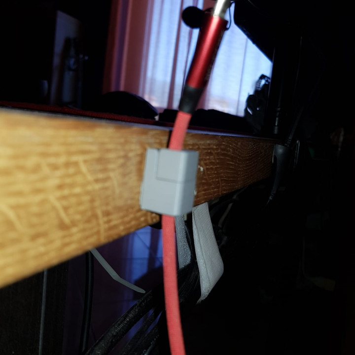 3D Printable Desk single cable organizer by Vincenzo Foti