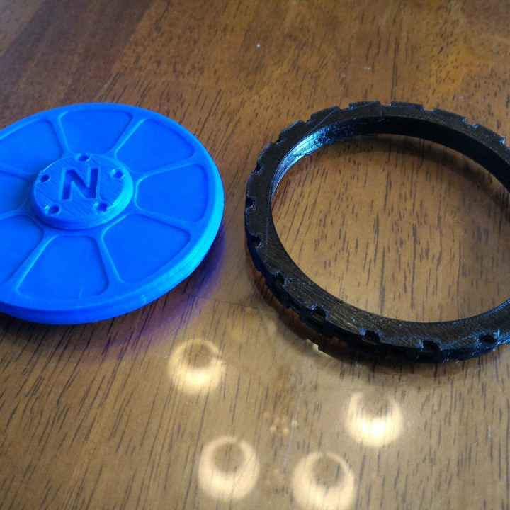 3D Printable Wheel fidget spinner - complete with tire by Dan Keller