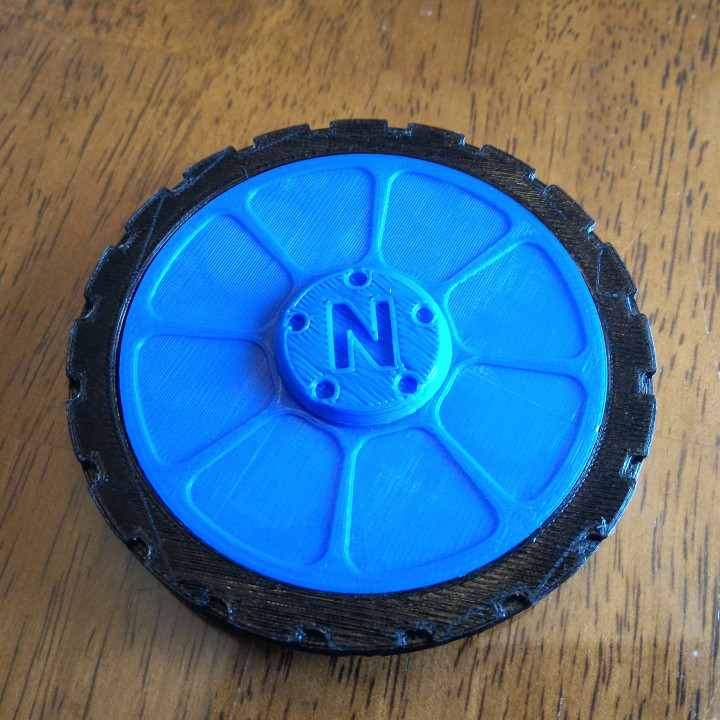 3D Printable Wheel fidget spinner - complete with tire by Dan Keller