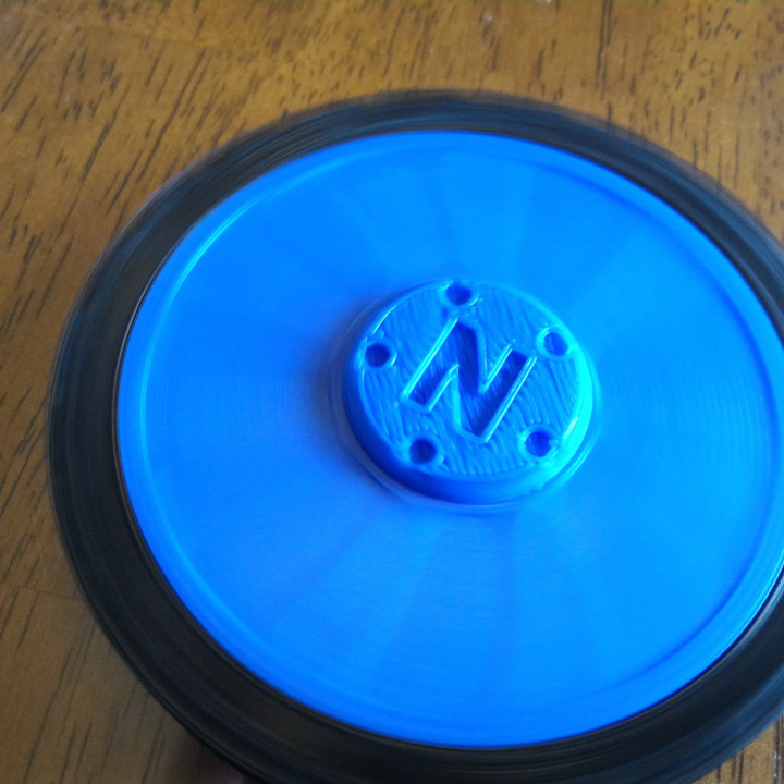 3D Printable Wheel fidget spinner - complete with tire by Dan Keller