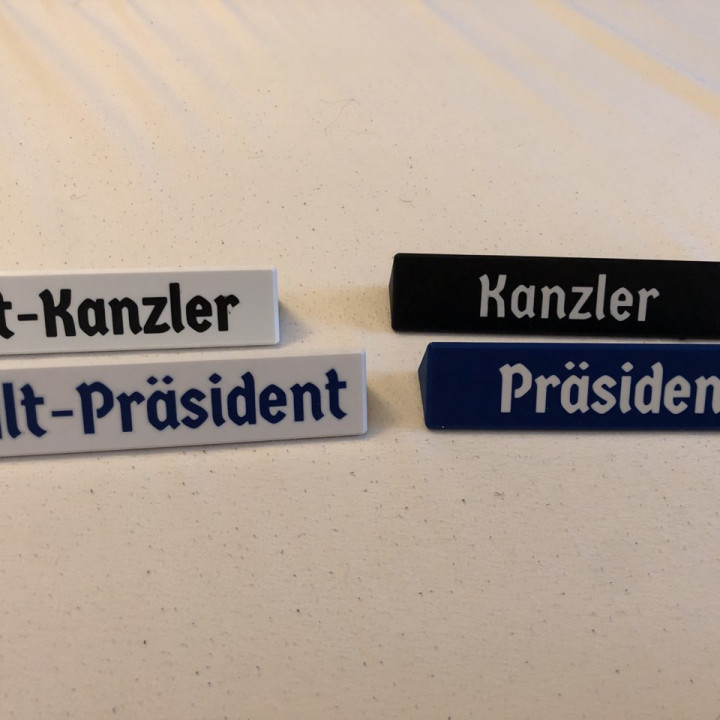 3D Printable 3D model only Secret Hitler Plaques by Caitlin