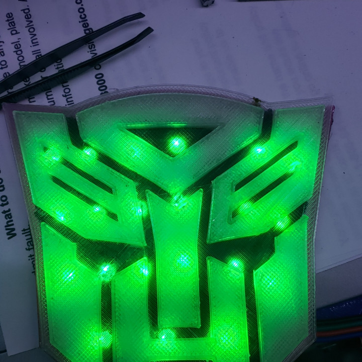 3D Printable Transformers Light Up Hood Ornament by Matthew Palulis