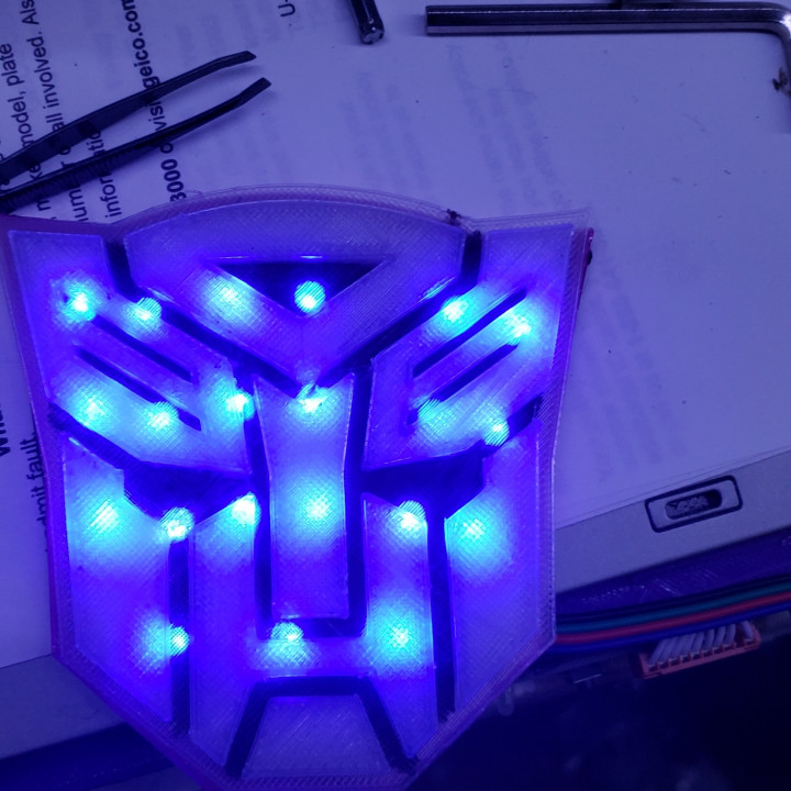 3D Printable Transformers Light Up Hood Ornament by Matthew Palulis