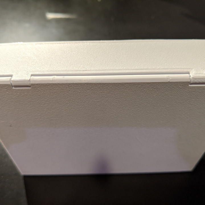 3D Printable Spark plug holder (holds 4) by Glenn Mason