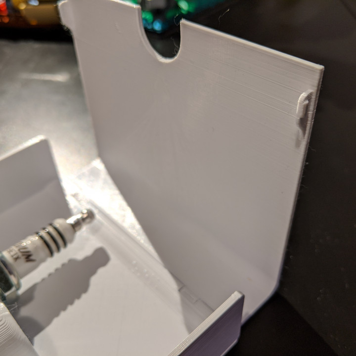 3D Printable Spark plug holder (holds 4) by Glenn Mason
